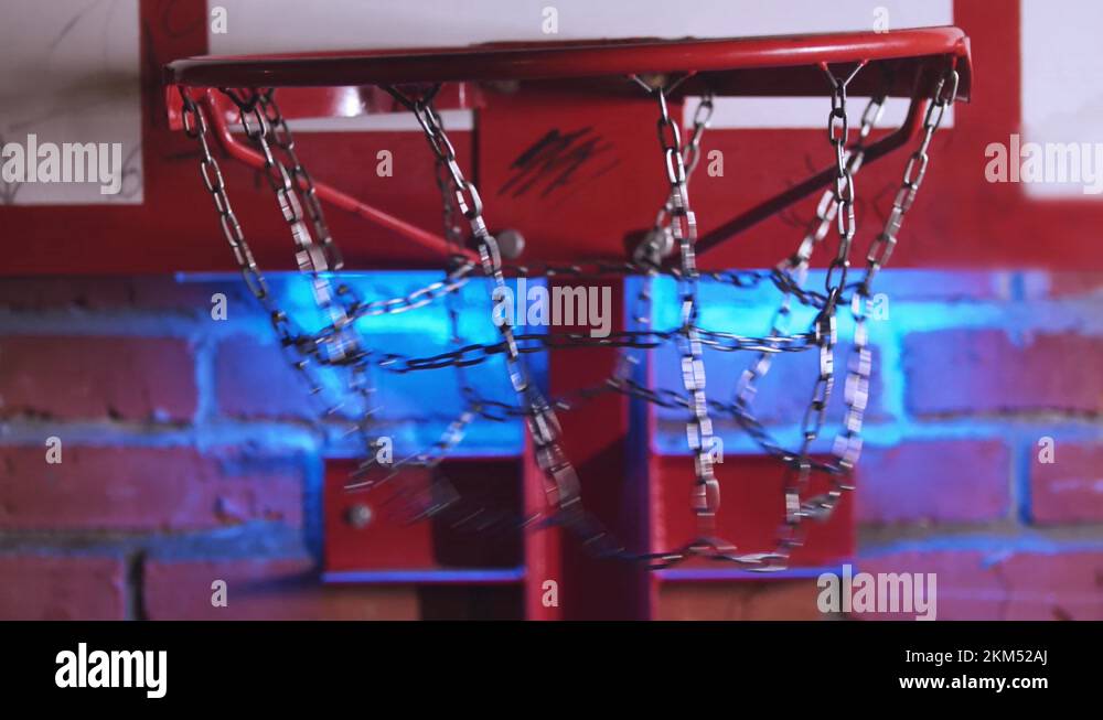 Throwing ball in the hoop with metal net and getting in the target ...