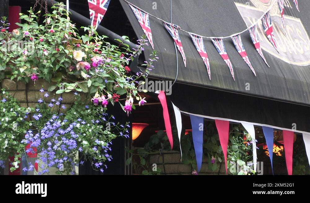 Pub with flags Stock Videos & Footage - HD and 4K Video Clips - Alamy