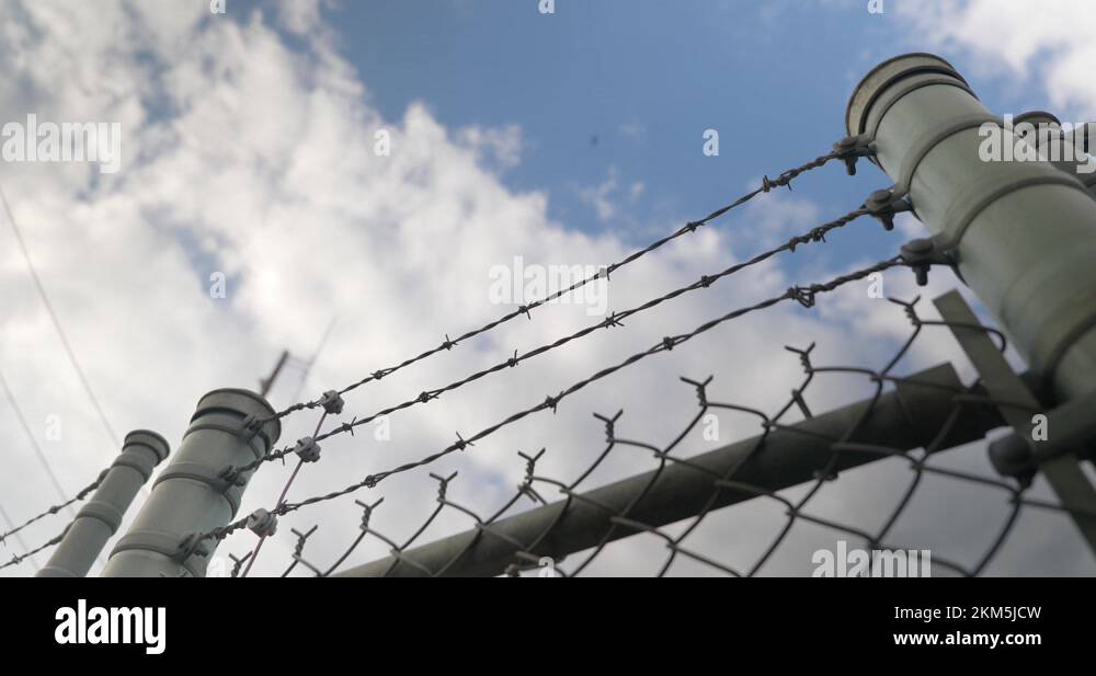 Blue chain link fence Stock Videos & Footage - HD and 4K Video Clips ...