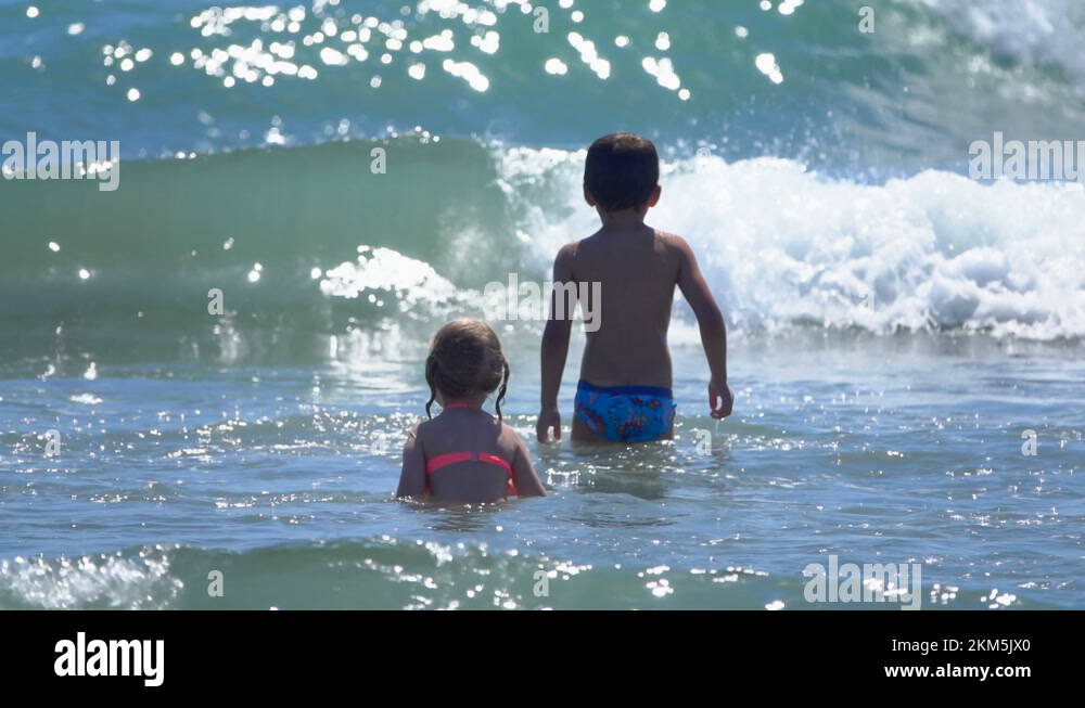 Boy on the beach jumping in waves Stock Videos & Footage - HD and 4K ...