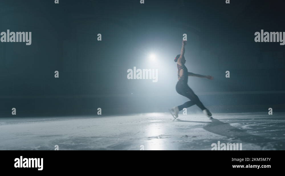 Female artistic figure skater performing single skating choreography on ...