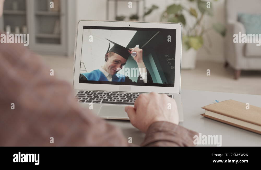 Parent Having Video Call with Son during Graduation Ceremony Stock ...