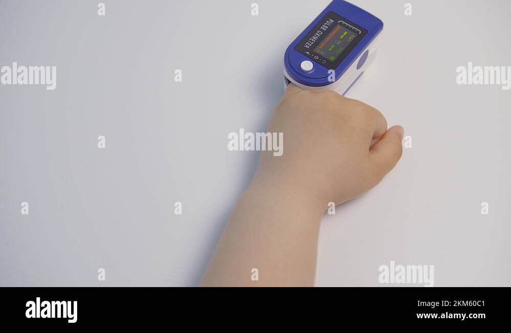 Close up of child hand with heart rate monitors for measuring oxygen ...