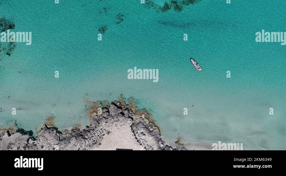 Aerial top down view of coast line. Drone shot moving from left to ...