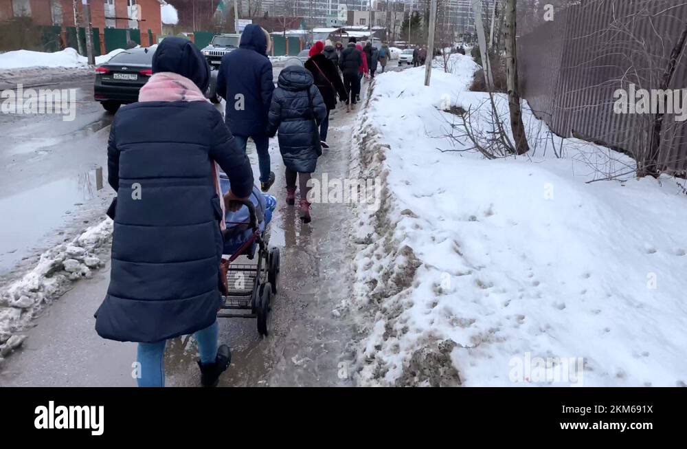 People walk through puddles Stock Video Footage - Alamy