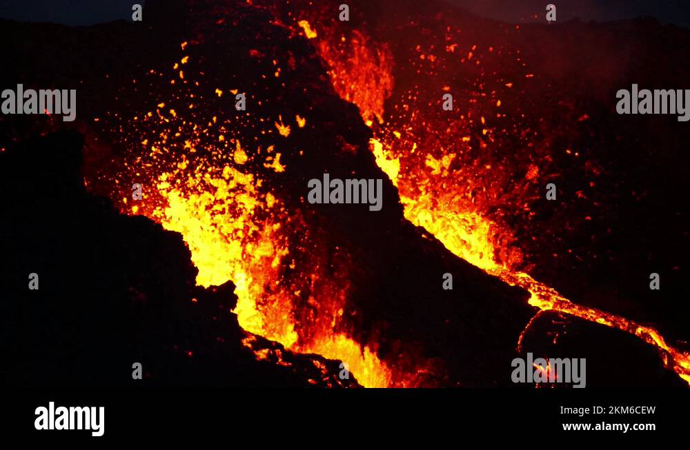 Erupting volcano at Fagradalsfjall, Iceland with spraying hot lava ...