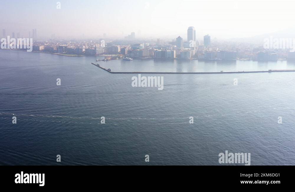 Beautiful scenery of metropolis with high-rise buildings at sea with ...