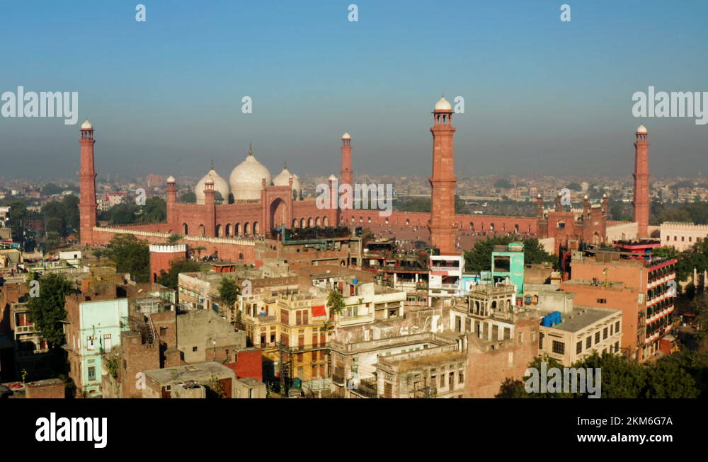 Pakistani Village With Tourists At Badshahi Mosque In Lahore City ...