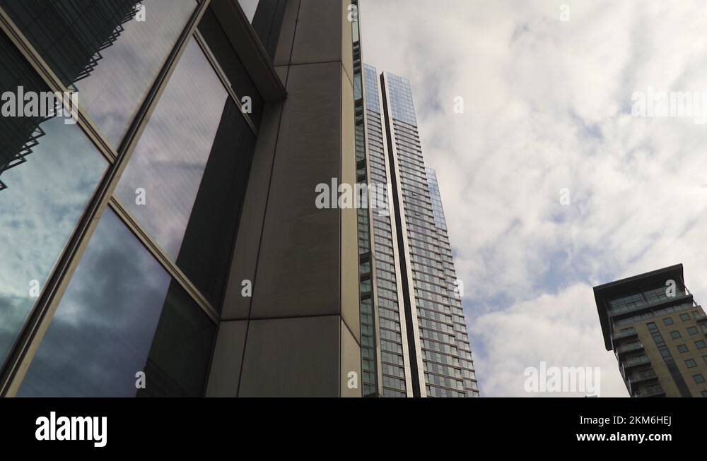 cinematic side view perpective of very tall buildings towers ...