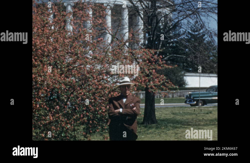 1950s Washington DC: Man posing by tree in front of Jefferson Memorial ...