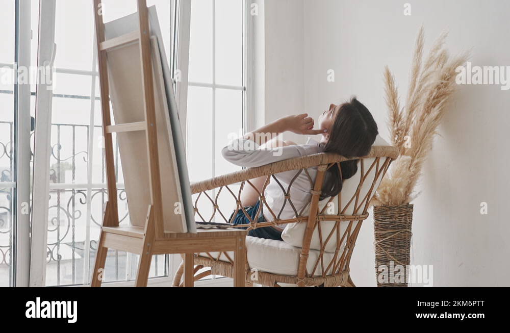 Lazy woman sitting in armchair Stock Videos & Footage - HD and 4K Video ...