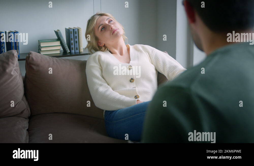 Young bored woman on psychological therapy in a psychotherapist's ...