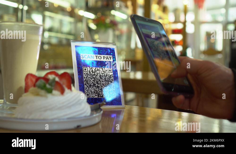 Display with qr code on the table in the restaurant. Contactless ...
