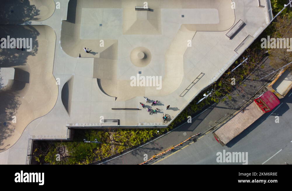 4k Ariel Tilting Drone Bird View over Skate Park Hong Kong showing BMX ...
