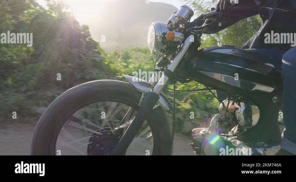 Biker Driving A Vintage Motorcycle On Country Road, Video In 4K Stock ...