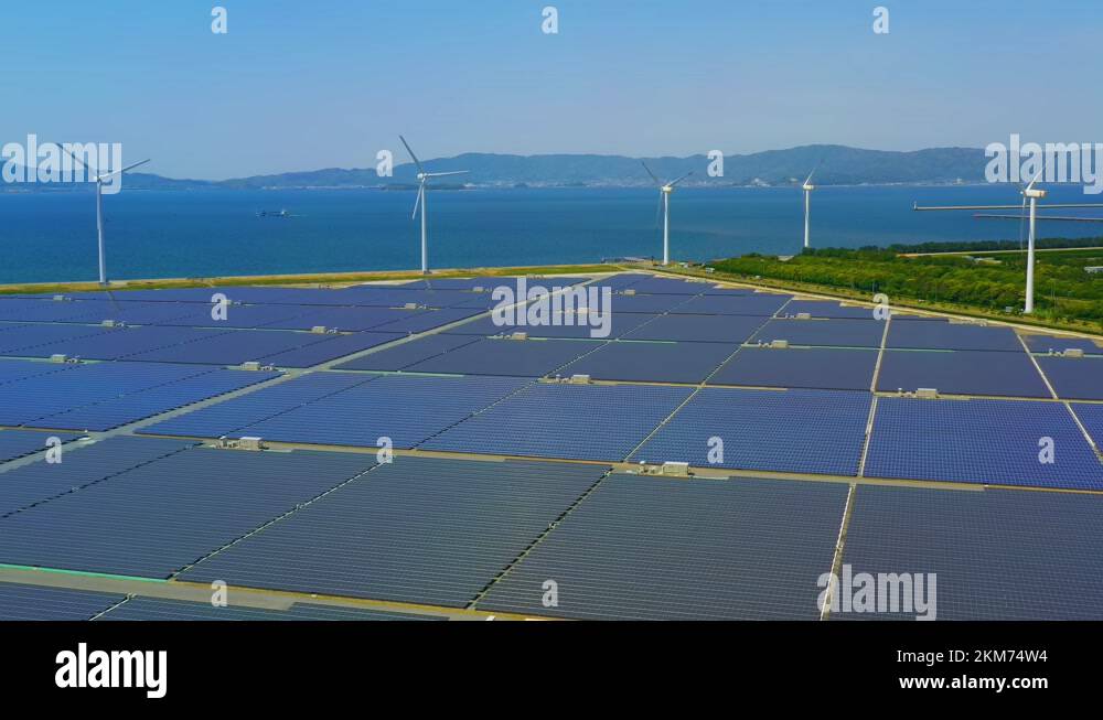 Renewable energy concept. Solar power plant and wind power plant aerial ...