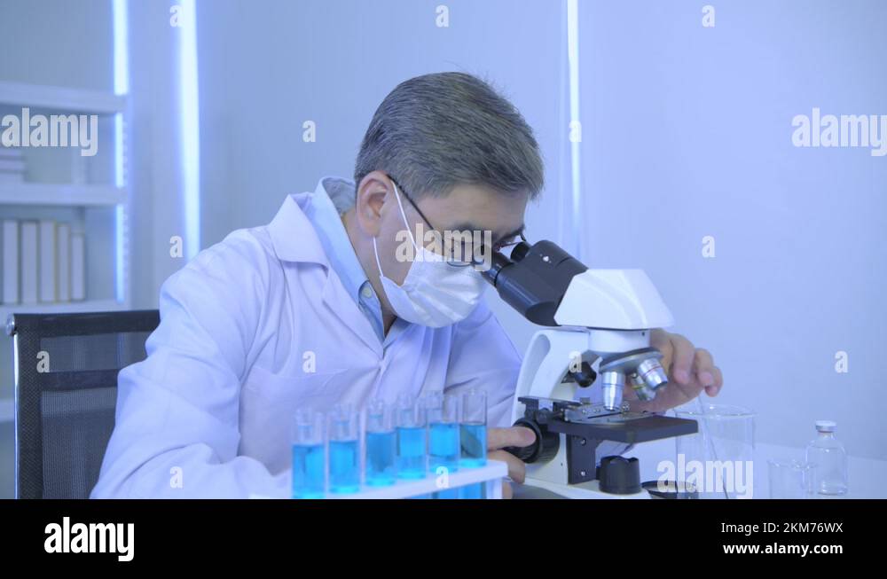 Research concept of 4k resolution. Asian scientists are examining the ...