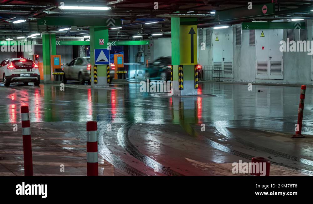 Entry and exit of cars from underground Parking lot of shopping mall ...