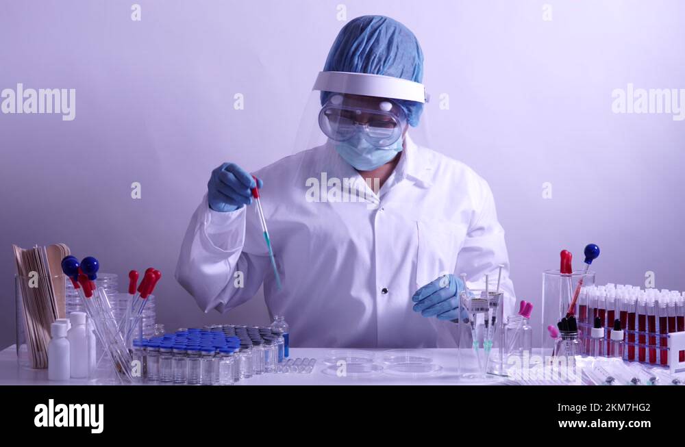 Medical laboratory with equipment and Microbiology scientist wearing ...