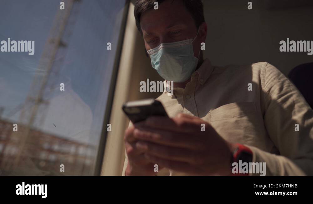New norm of public transport, person travels on train sits at safe ...