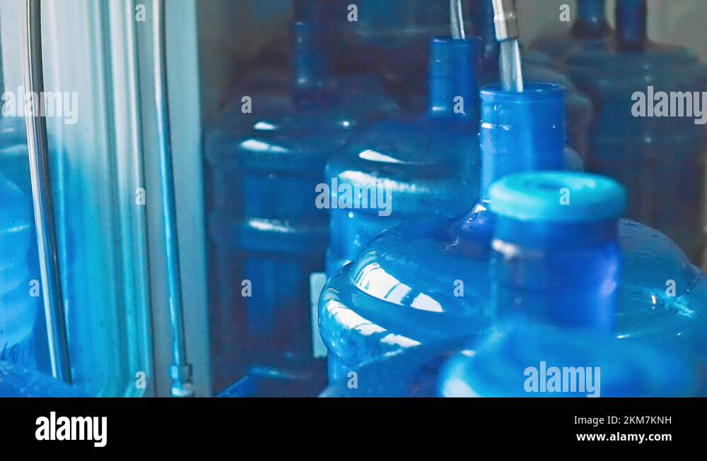 Refilling containers Stock Videos & Footage - HD and 4K Video Clips - Alamy