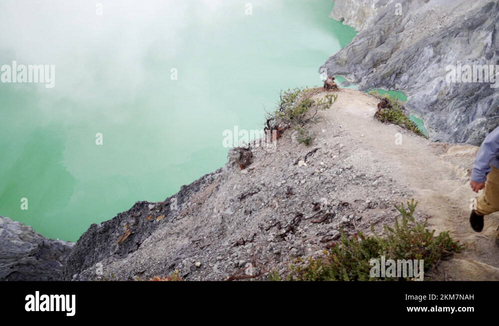 Slow Motion Panning The Crater Lake Of Ijen Volcano With Rising Vent ...