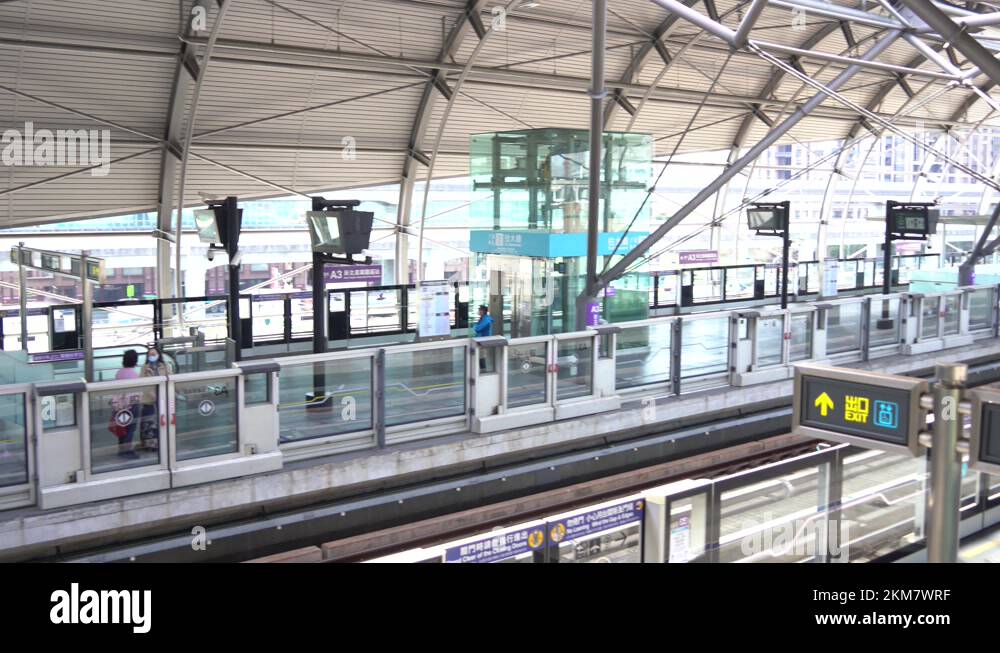A footage of quiet airport express train MRT station in Taiwan due to ...