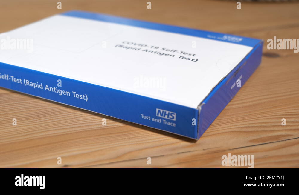 Close up focus pull Covid-19 rapid flow antigen NHS Test and Trace home ...