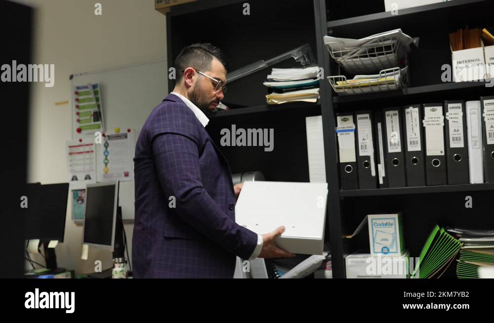 Reviewing files in office Stock Videos & Footage - HD and 4K Video ...