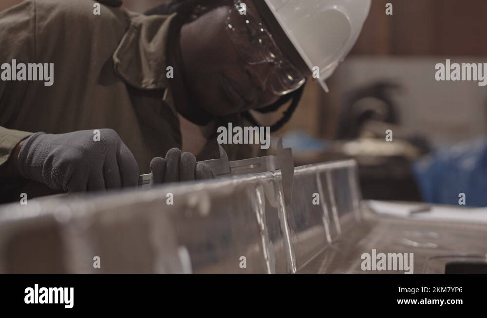 Female African Worker Using Caliper Stock Video Footage - Alamy