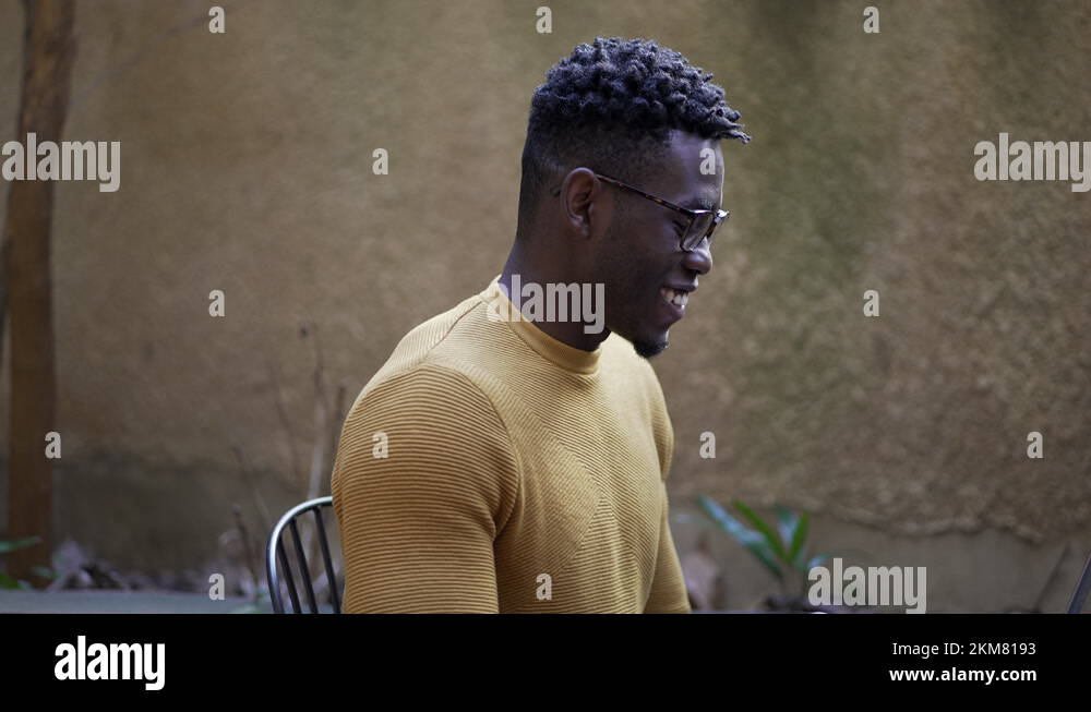 Smart young black African man smiling and laughing Stock Video Footage ...