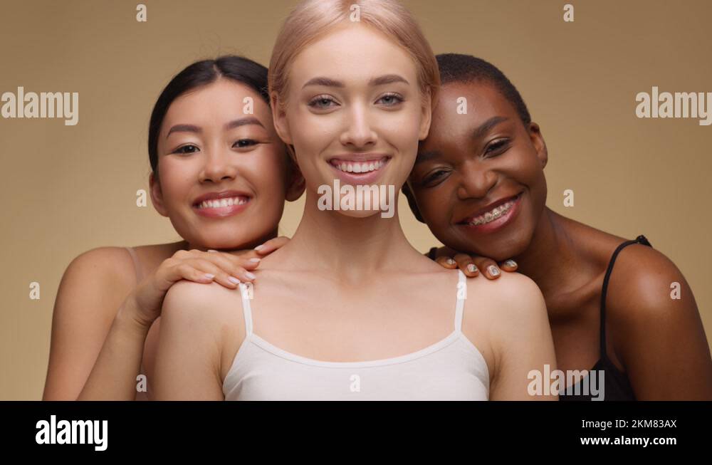 Female friendship and connection. Three happy multiethnic ladies posing ...