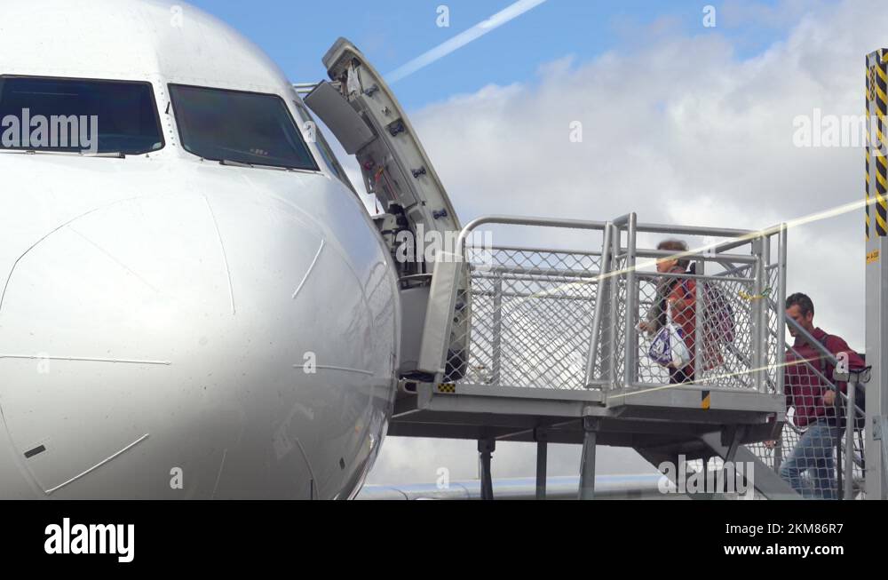 Passengers boarding aircraft Stock Videos & Footage - HD and 4K Video ...