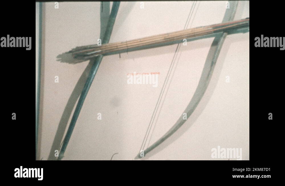 1970s: Bows and arrows in display case of museum Stock Video Footage ...