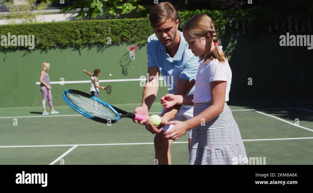 Father daughter play tennis together Stock Videos & Footage - HD and 4K ...