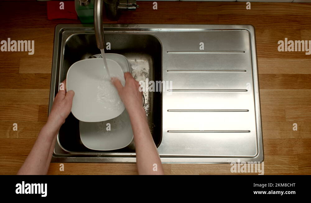 Woman washing up dishes sink Stock Videos & Footage - HD and 4K Video ...