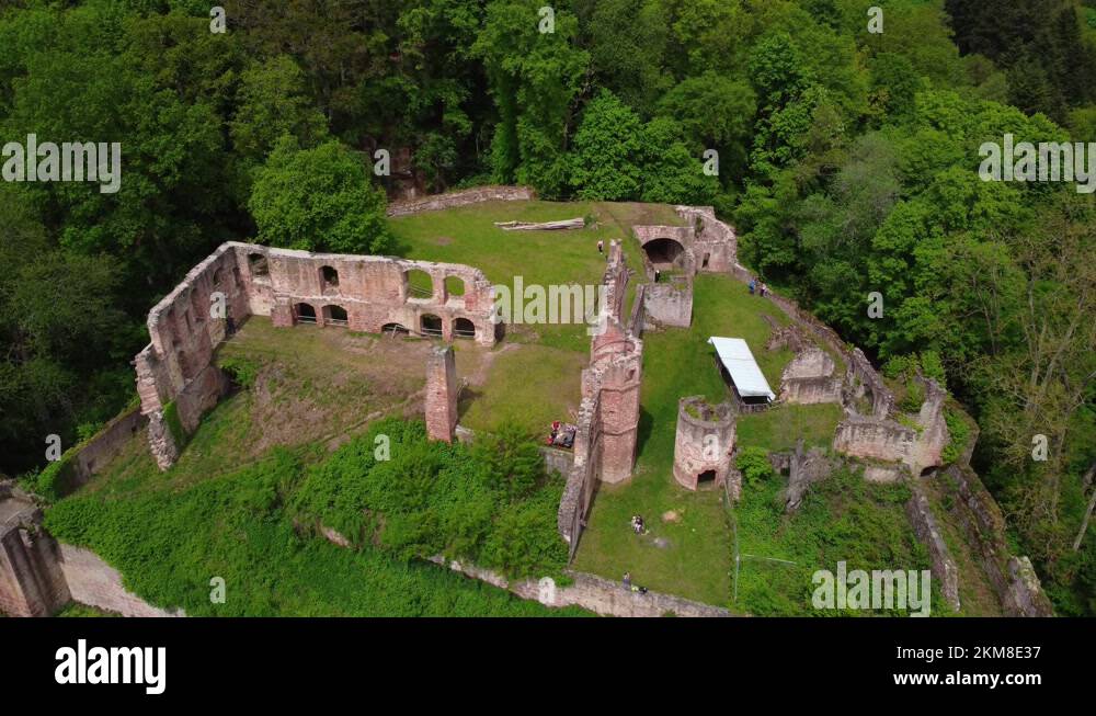 Ancient castle ruins in the forest with tourists Stock Video Footage ...