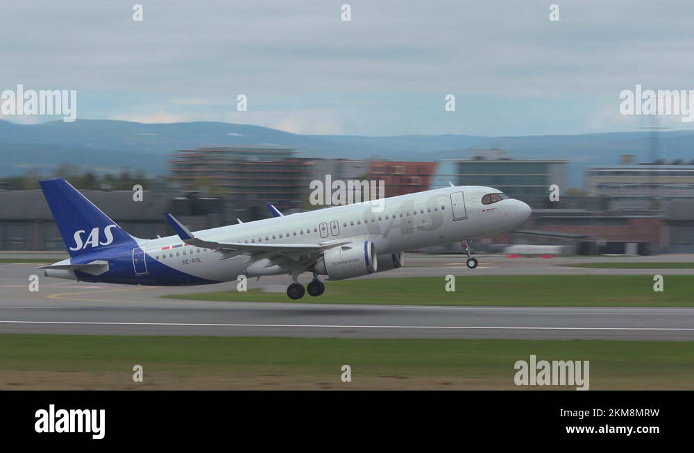 airplane sas airbus a320 neo taking off slow motion passing tower Stock ...
