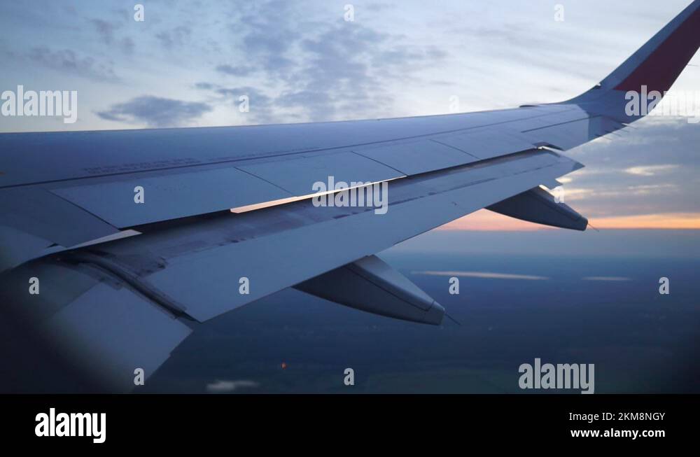 airplane wing in flight view from the window of an airplane Stock Video ...