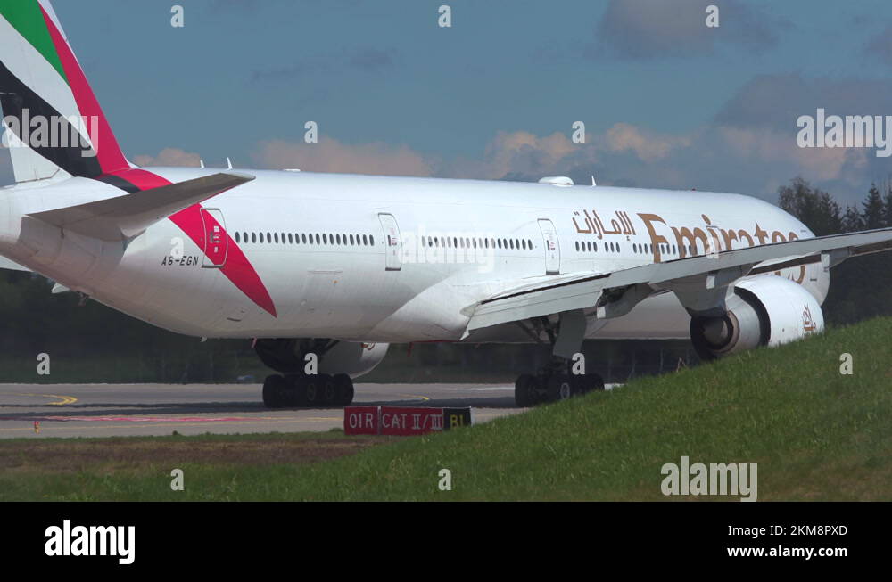 airplane boeing 777 emirates taxiway rear view slow forward oslo ...