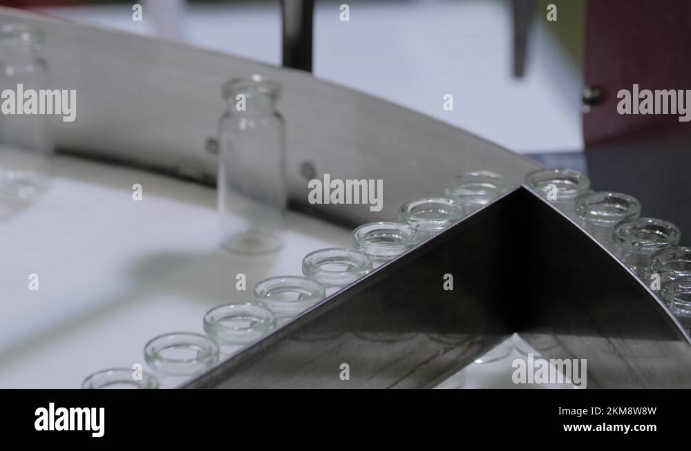 Pharmaceutical production line - conveyor belt with empty injection ...
