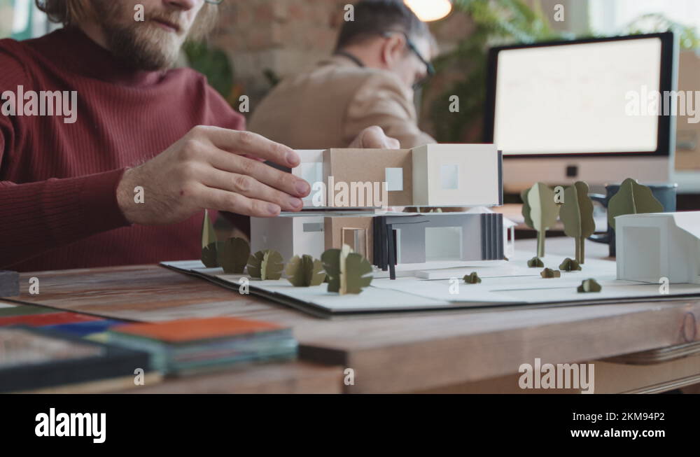 Architect Constructing 3D Layout of Building Stock Video Footage - Alamy