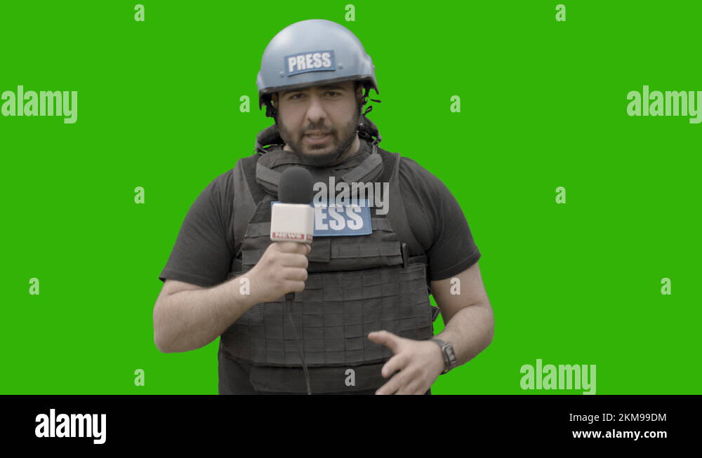 GREEN SCREEN CHROMA KEY War journalist wearing protective gear ...