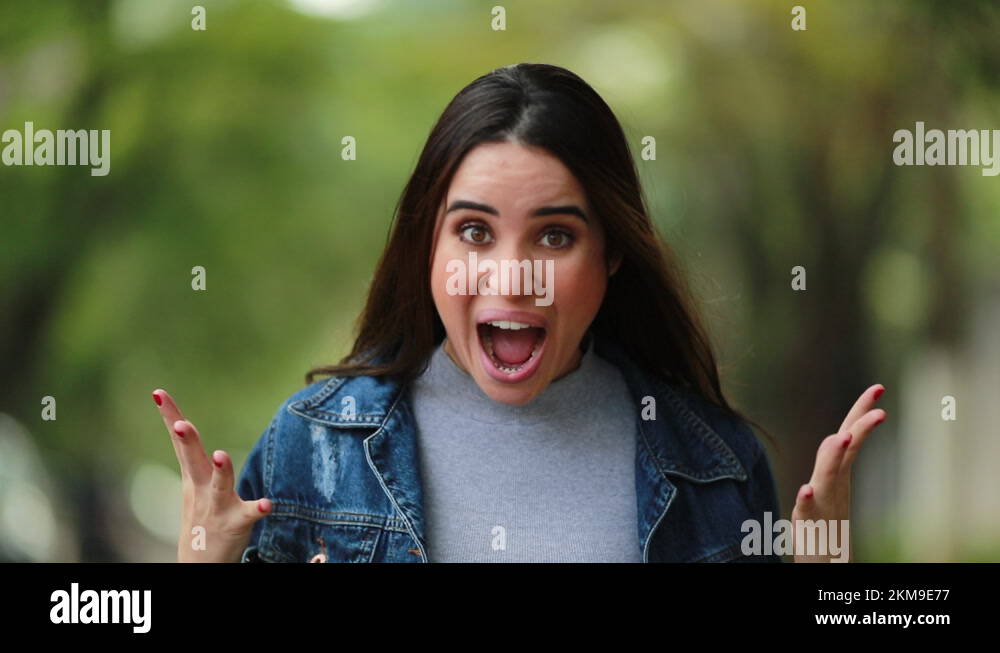 Young woman shocking reaction. Girl reacting with surprise. WOW emotion ...