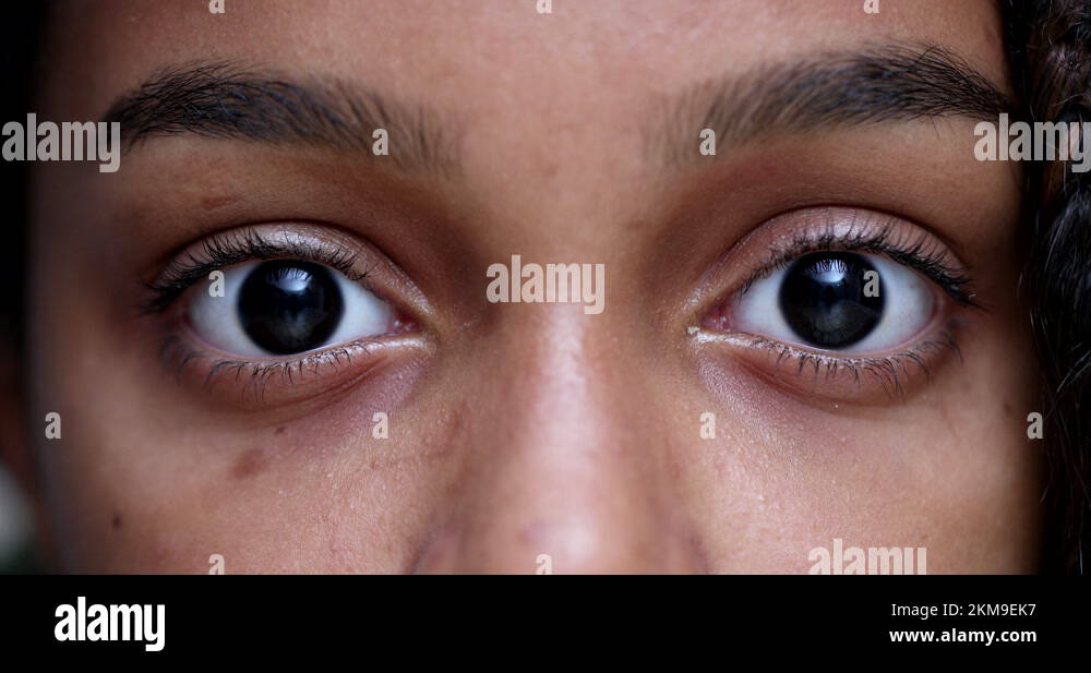 Black teen girl staring at camera, child closing eyes Stock Video ...