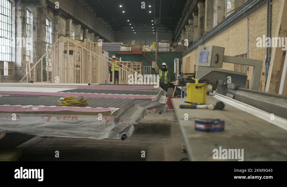 Overview of construction work happening inside warehouse, England, UK ...