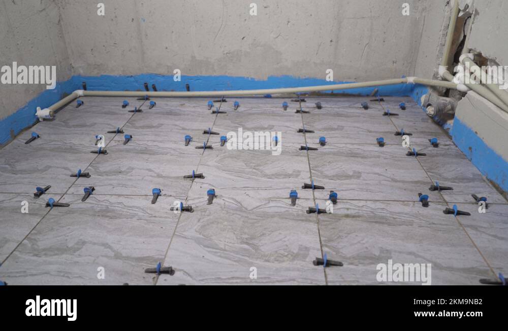 Laying ceramic tiles Stock Videos & Footage - HD and 4K Video Clips - Alamy