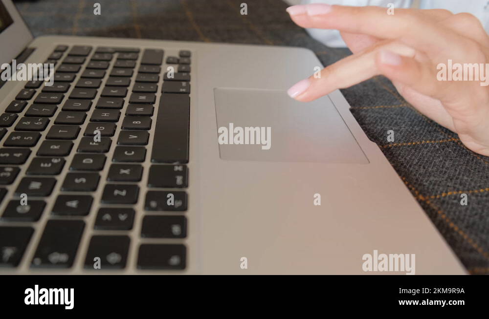 Female fingers on the keyboard and running on the touchpad Stock Video ...