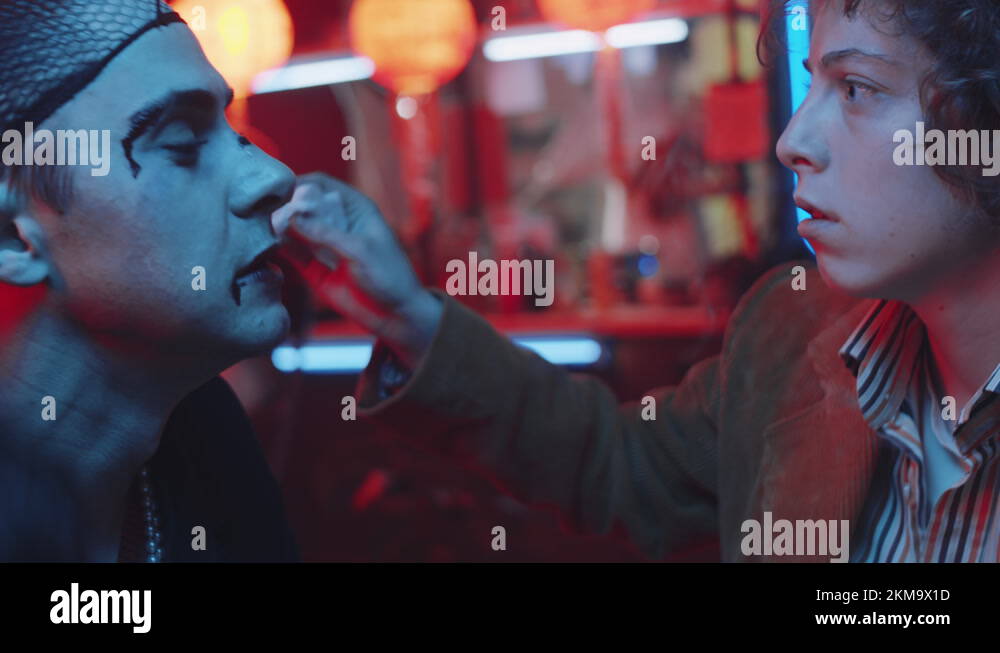 Woman Wiping Blood off Face of Transgender Man in Bar Stock Video ...