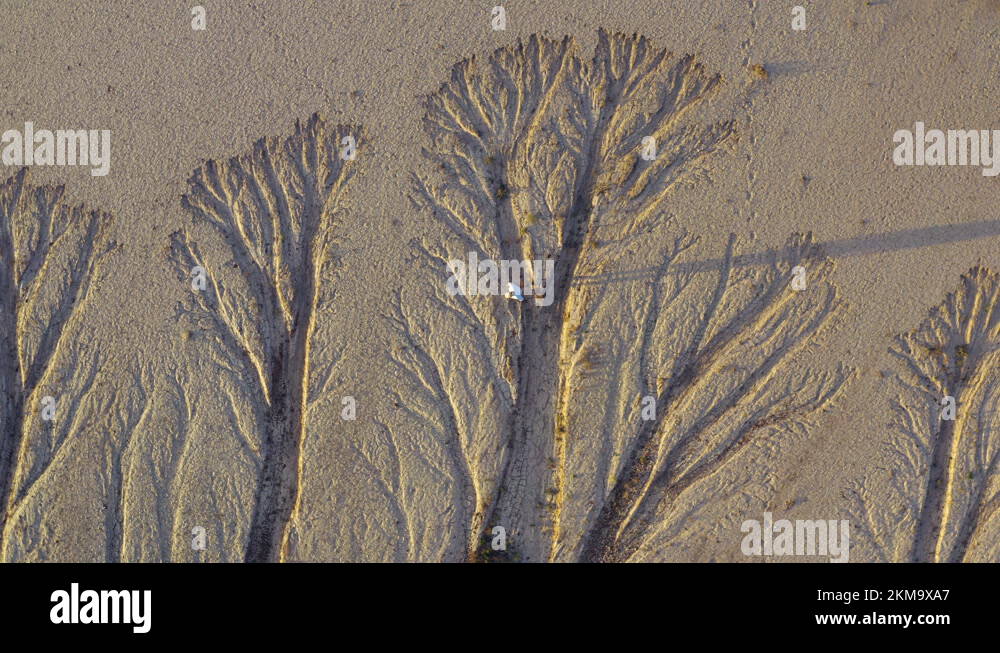 Climate change.Aerial.Devastated farmer walking across dry dam due to ...